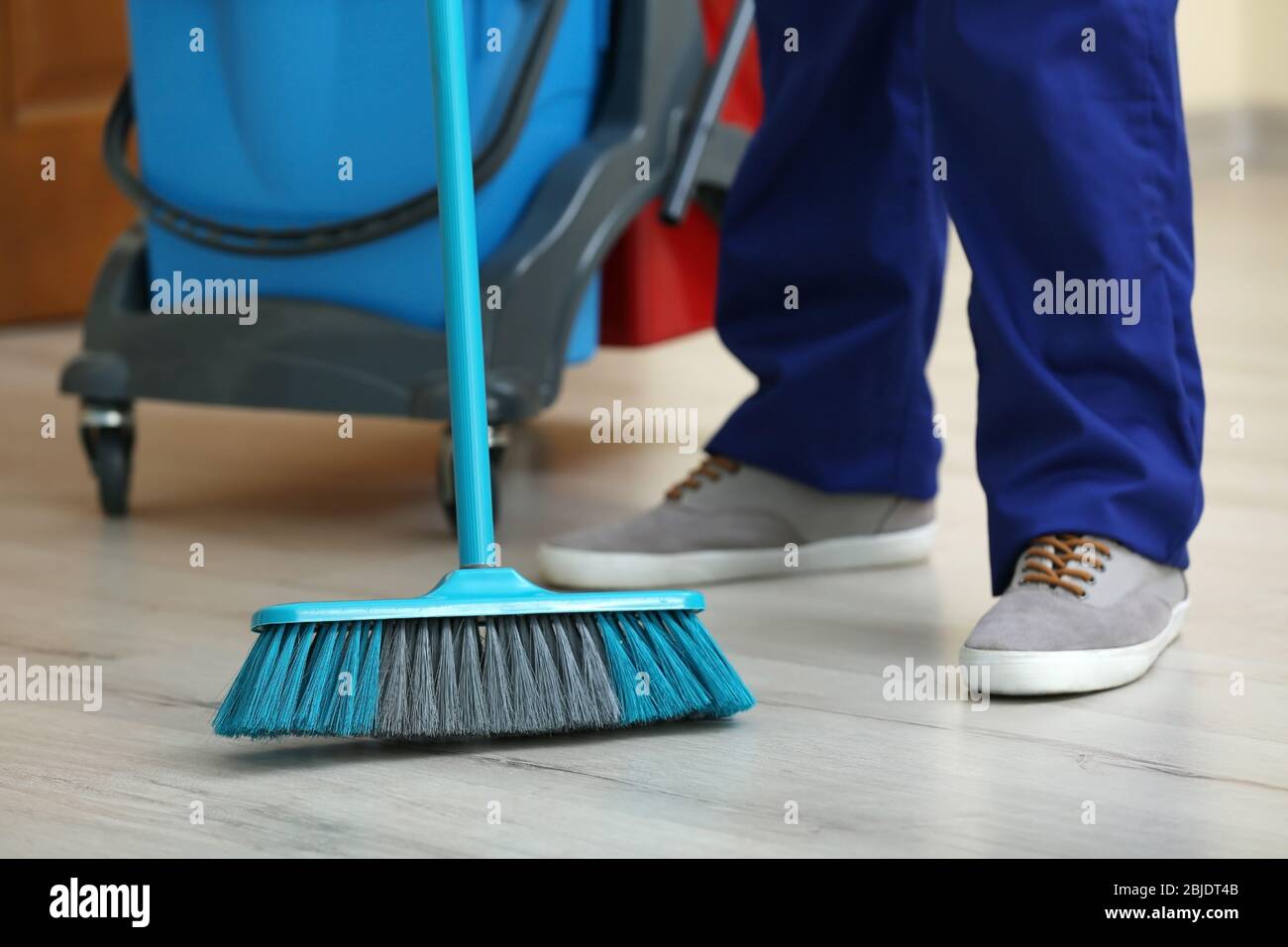Closeup man legs cleaning floor hi-res stock photography and images - Alamy