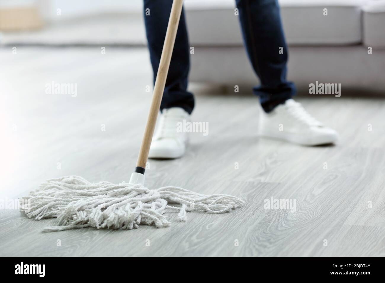Closeup man legs cleaning floor hi-res stock photography and images - Alamy