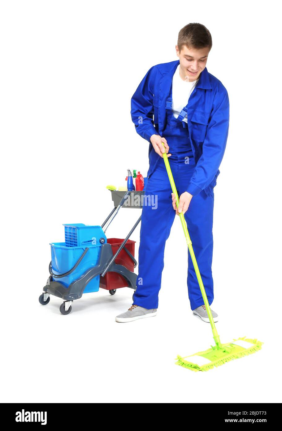 Young service man cleaning floor on white background Stock Photo - Alamy