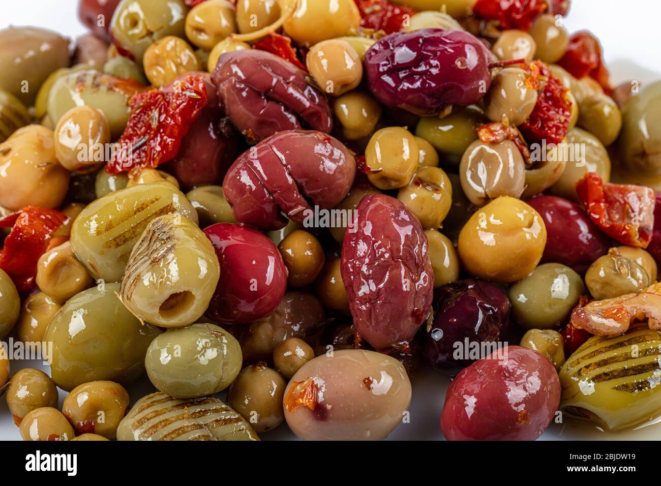 Mix of black olives, beet olives, green olives stuffed with red pepper ...