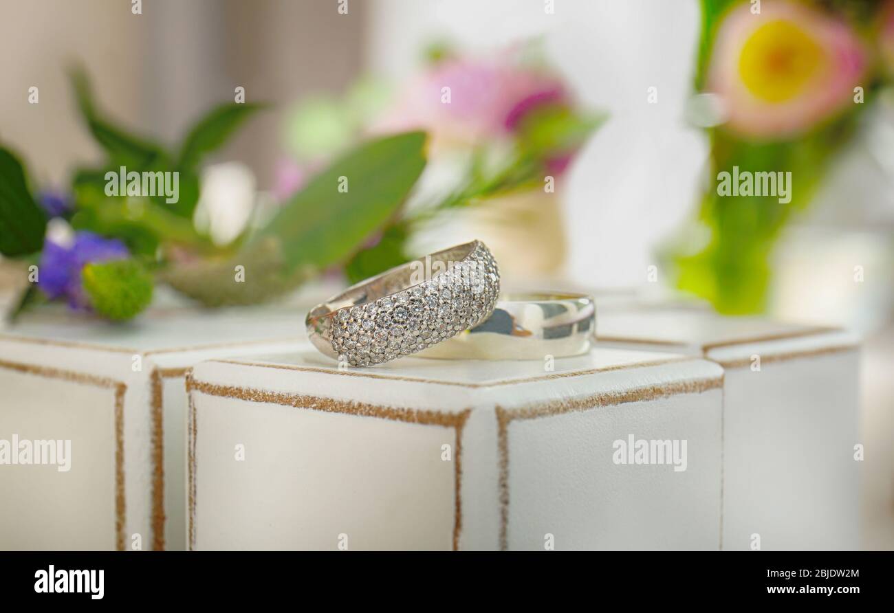 Composition two wedding rings hi-res stock photography and images - Alamy