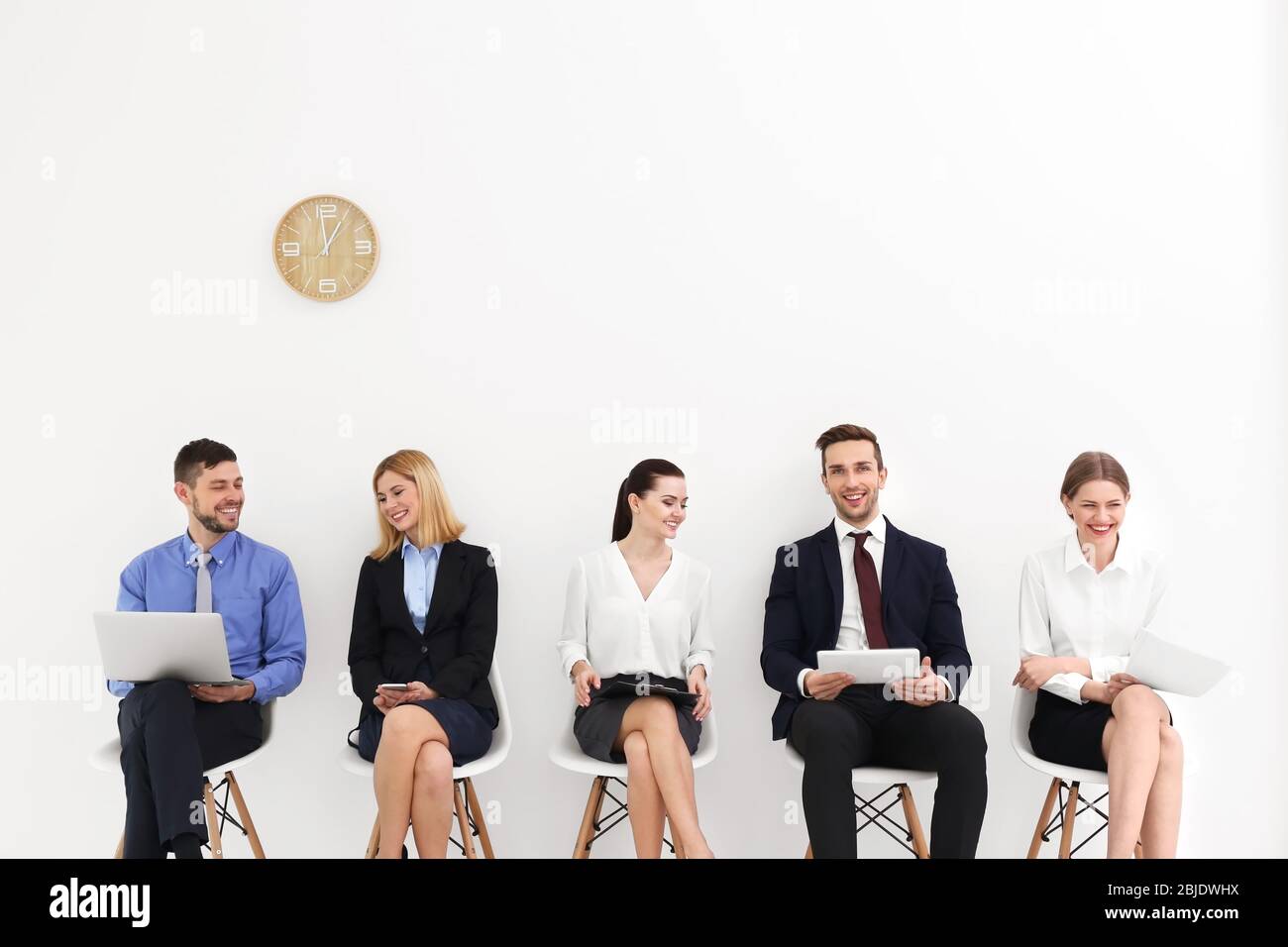 Group of people waiting for job interview on white background Stock ...