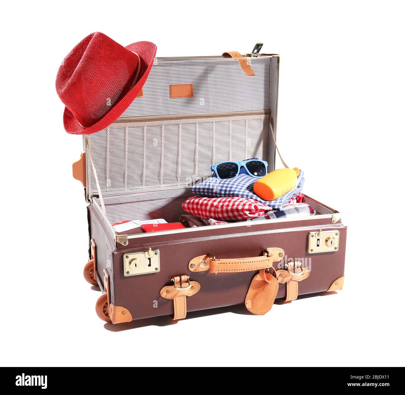 Packed traveller suitcase on white background Stock Photo - Alamy