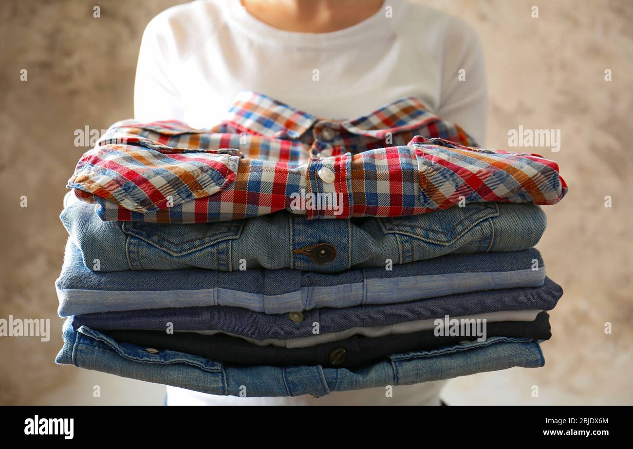 Stack shirts in clothes shop hi-res stock photography and images - Alamy