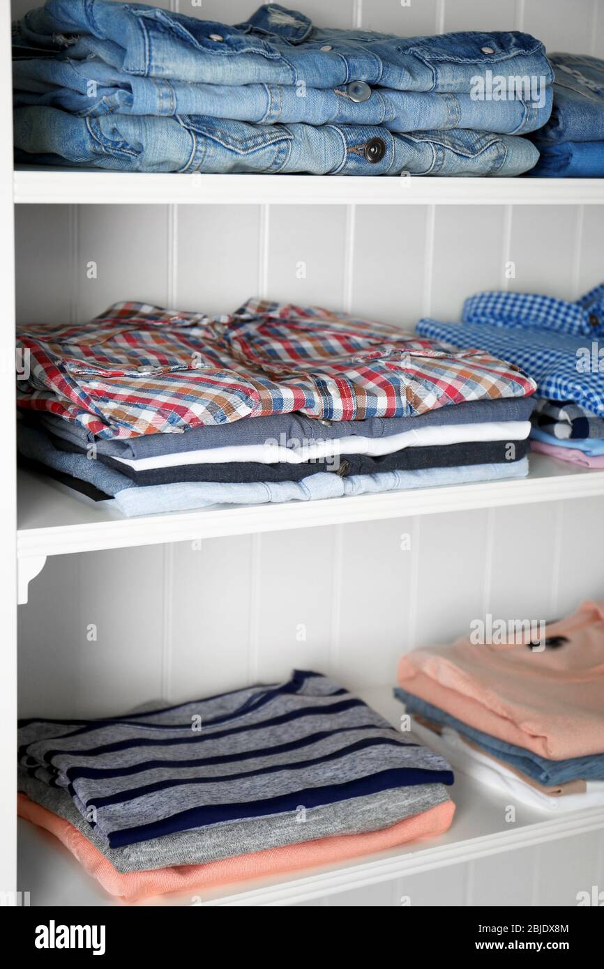 Stack of folded jeans on store shelves hi-res stock photography and ...