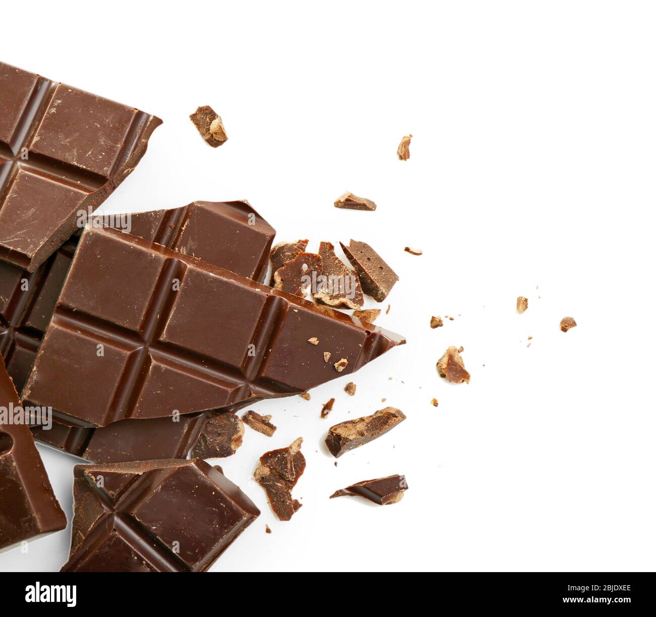 Broken chocolate bar on white background Stock Photo - Alamy