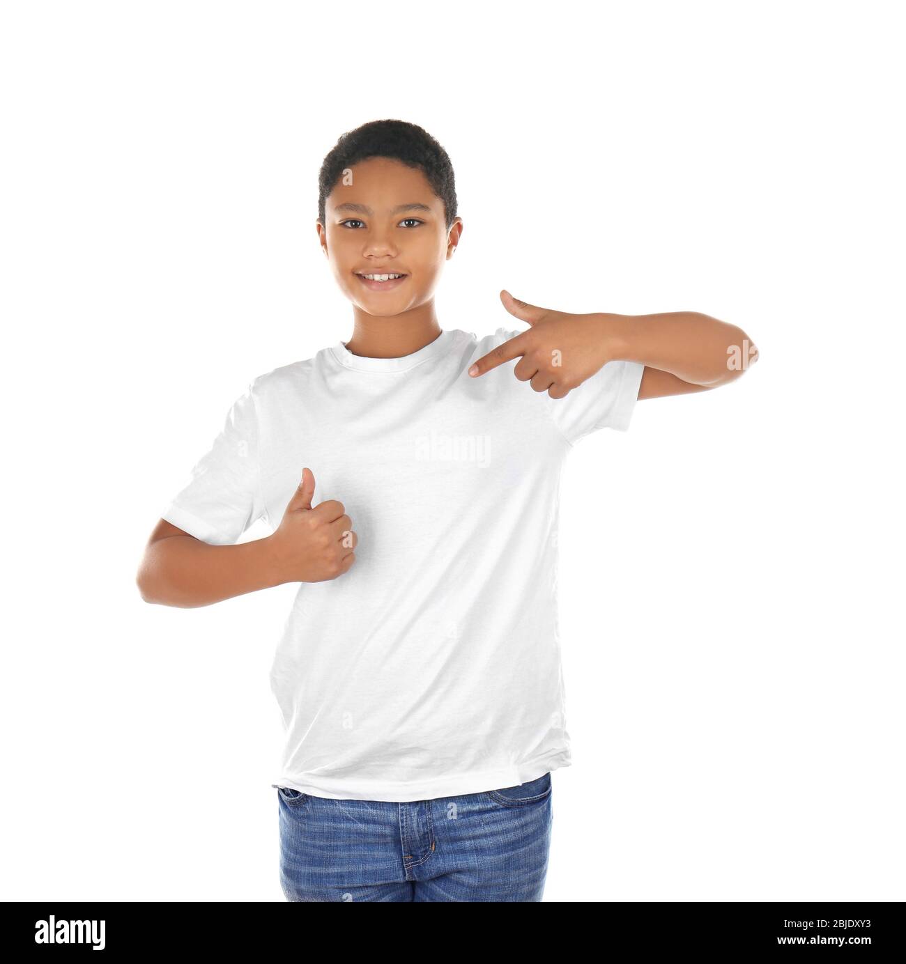 Young African American boy in blank white t-shirt standing on white ...
