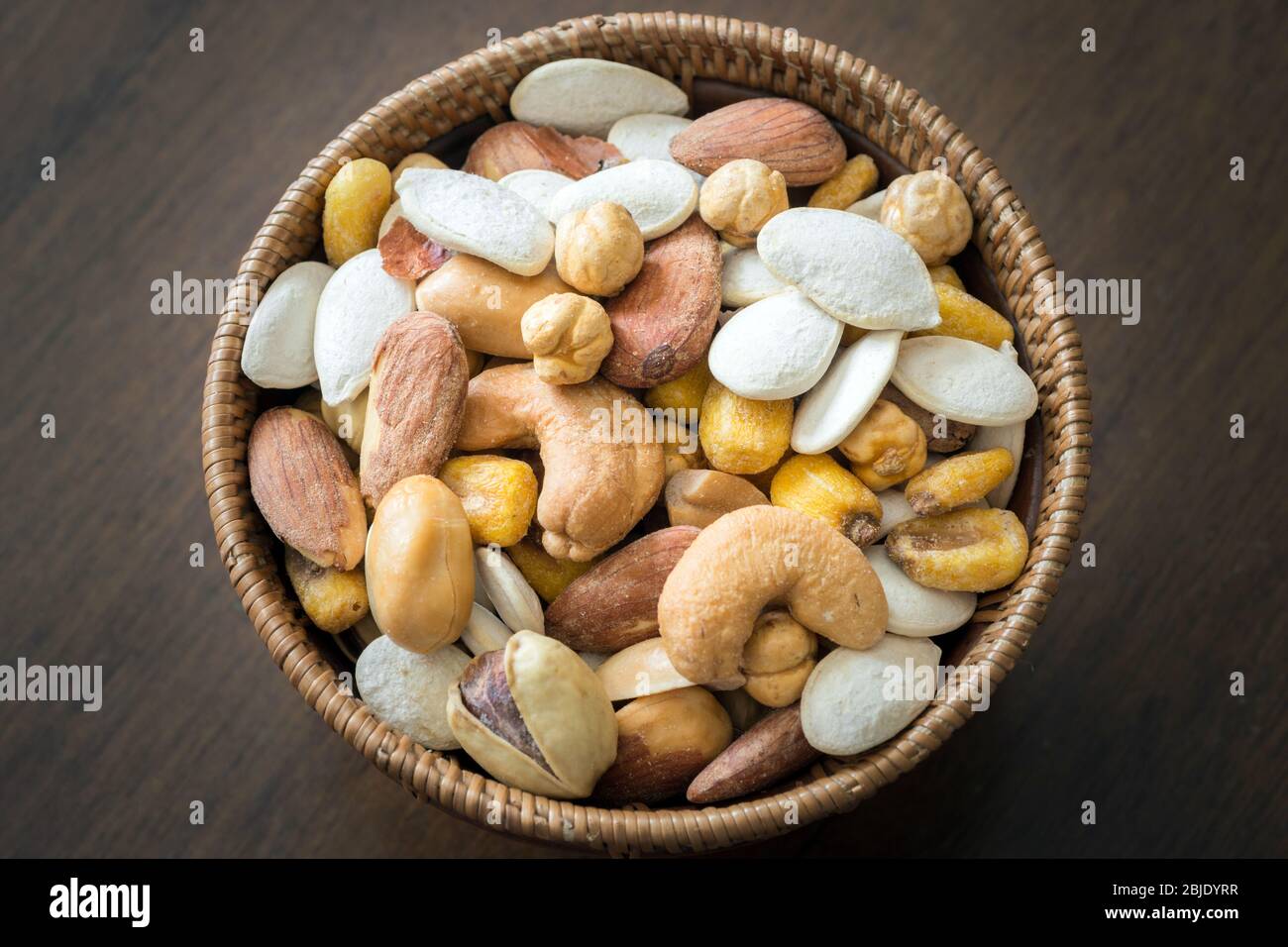 Roasted and salty, mixed nuts and kernels snack Stock Photo - Alamy