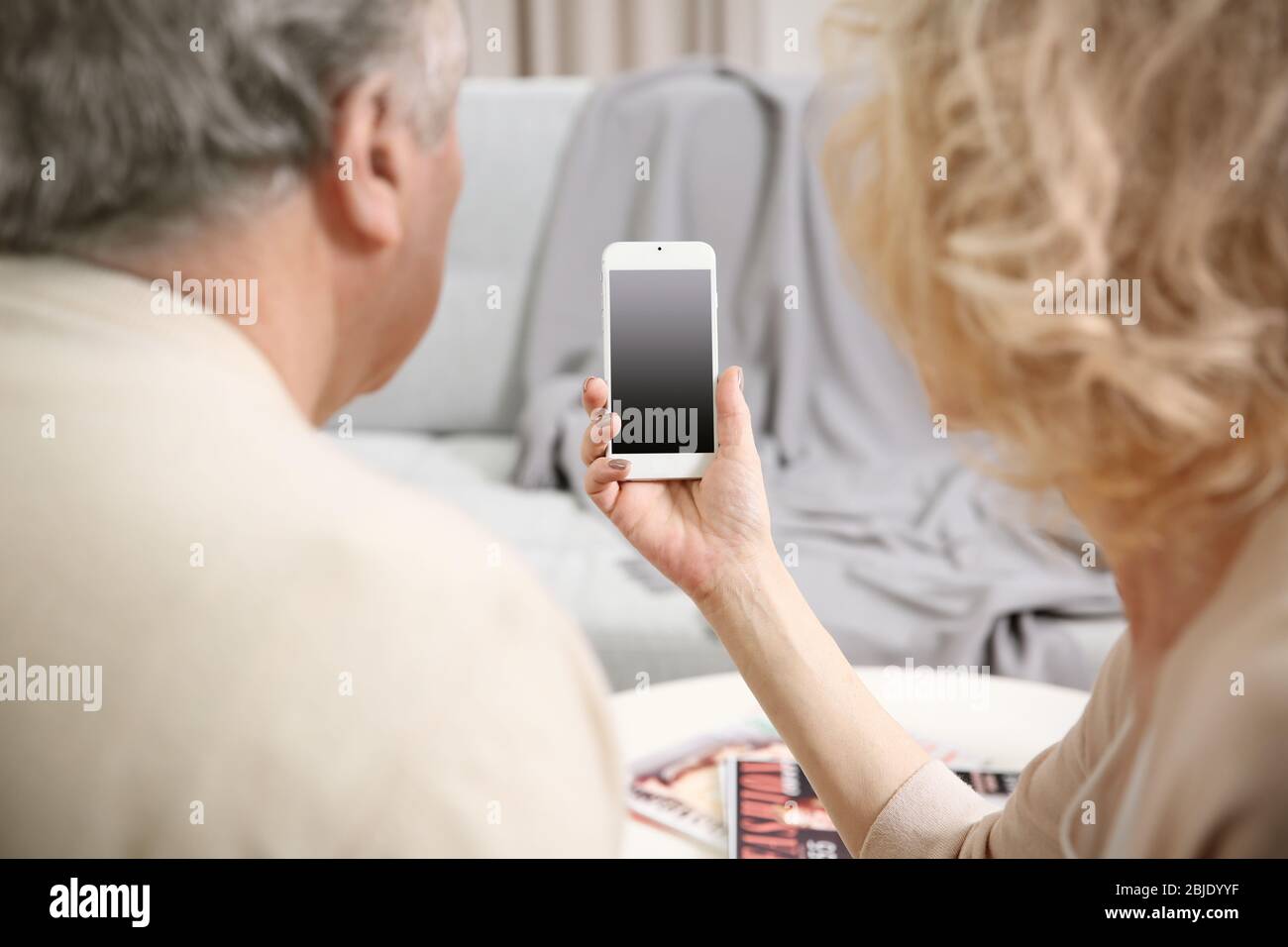 Husband making phone call wife hi-res stock photography and images - Alamy