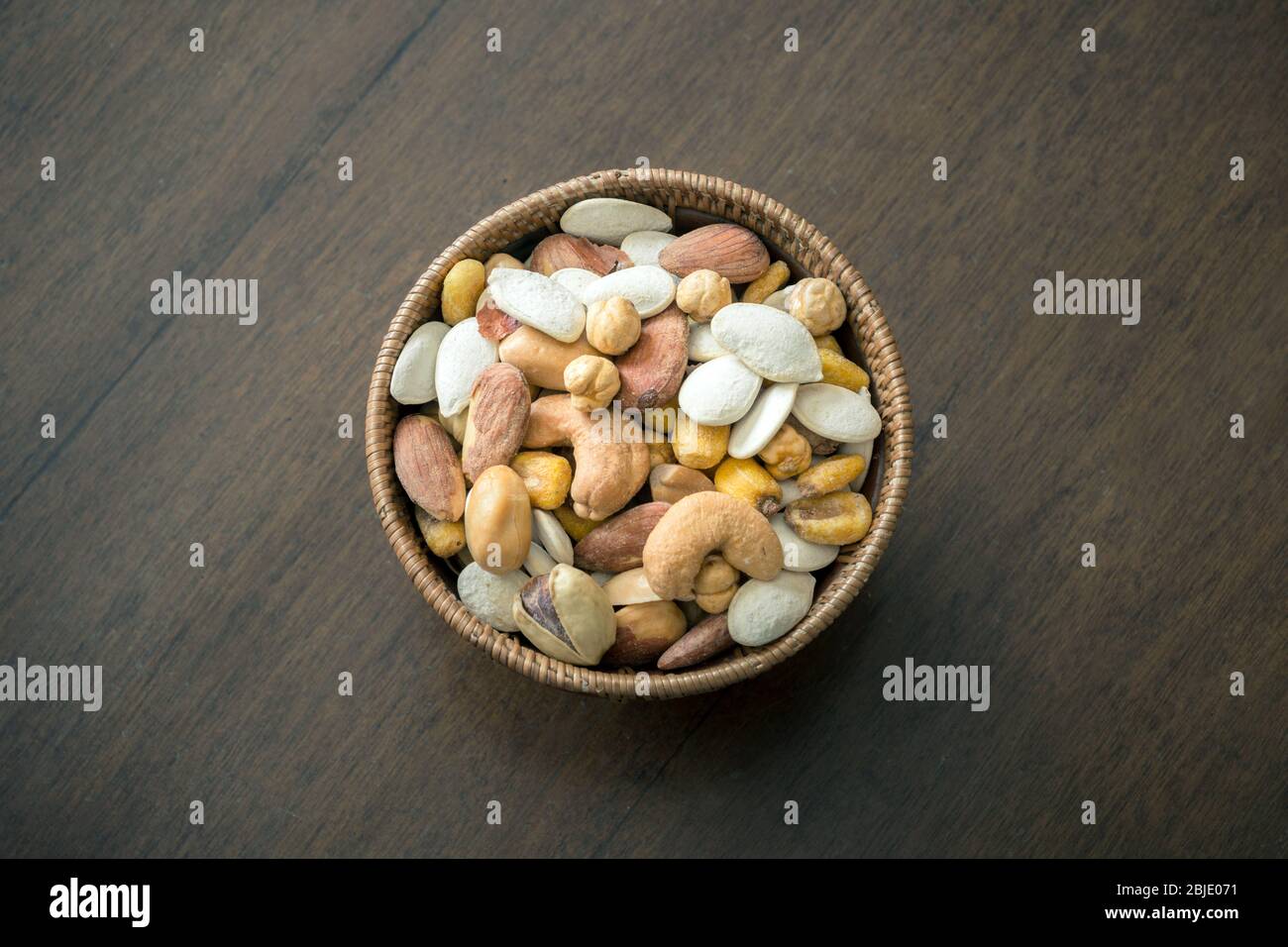 Roasted and salty, mixed nuts and kernels snack Stock Photo - Alamy