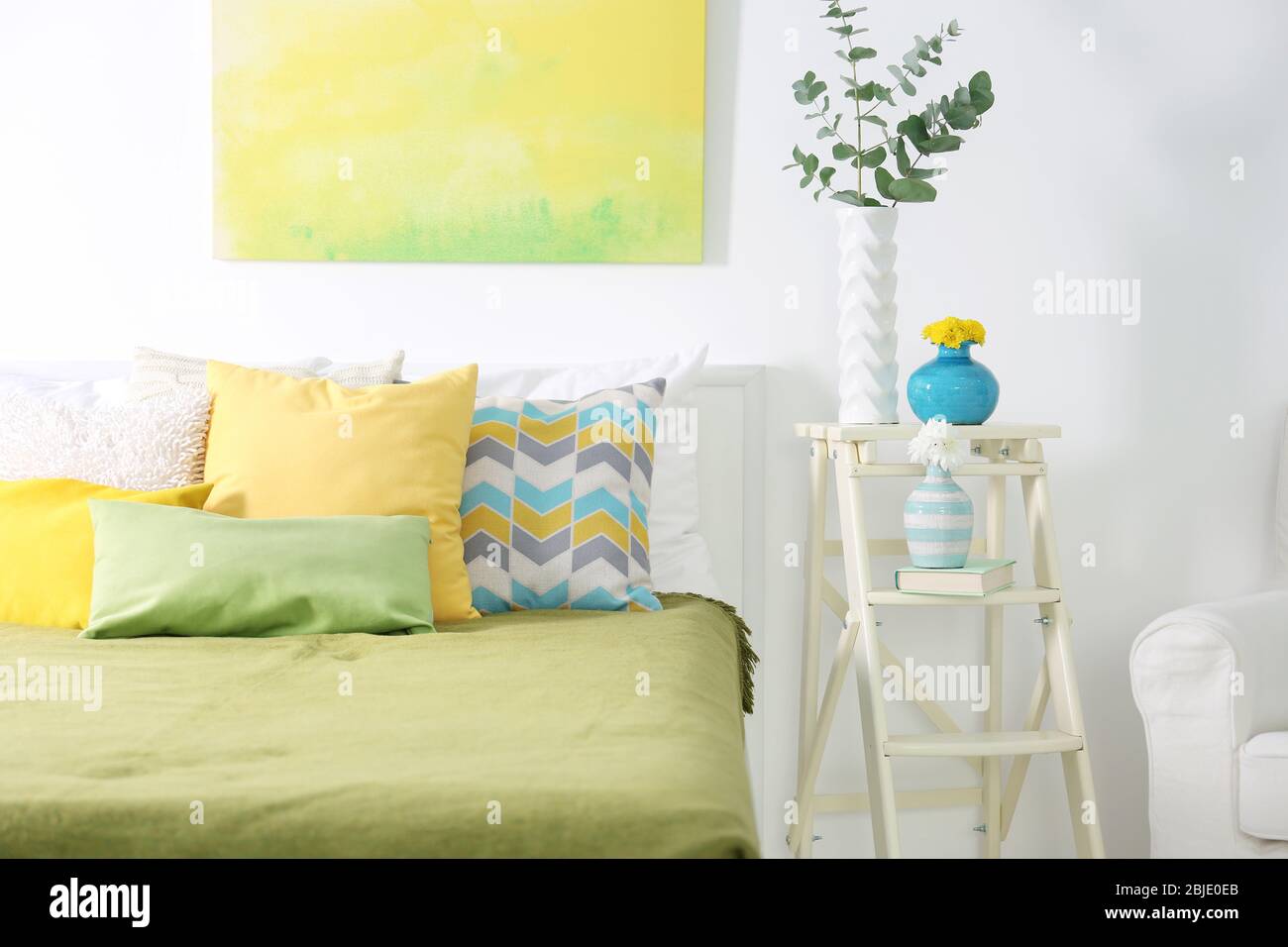 Color interior of modern bedroom with cozy double bed Stock Photo - Alamy
