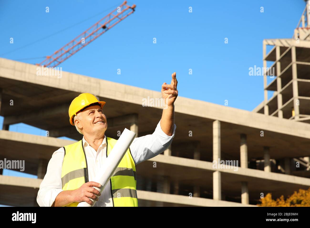Senior engineer drawing standing hi-res stock photography and images ...