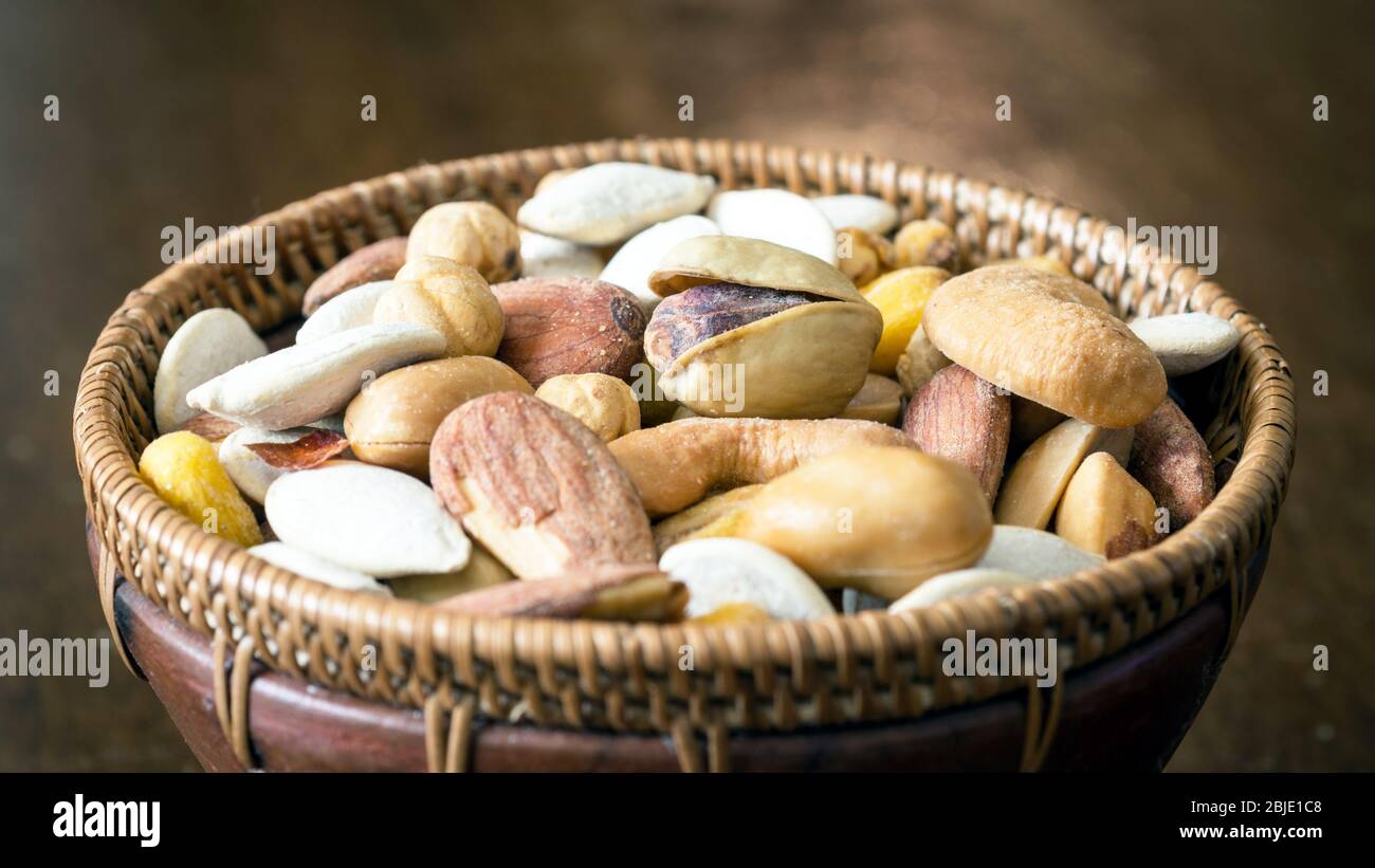 Roasted and salty, mixed nuts and kernels snack Stock Photo - Alamy