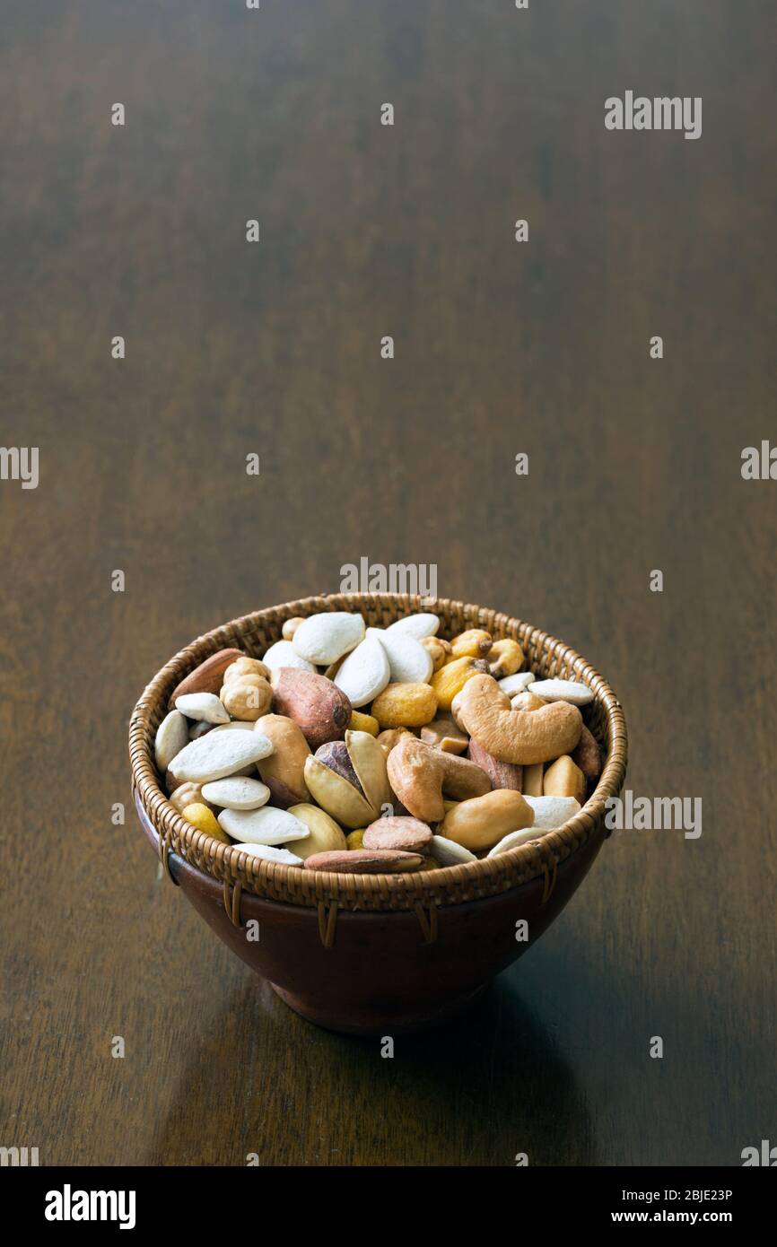 Roasted and salty, mixed nuts and kernels snack Stock Photo - Alamy