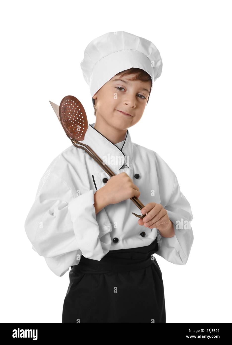 Cute boy in chef uniform on white background Stock Photo - Alamy