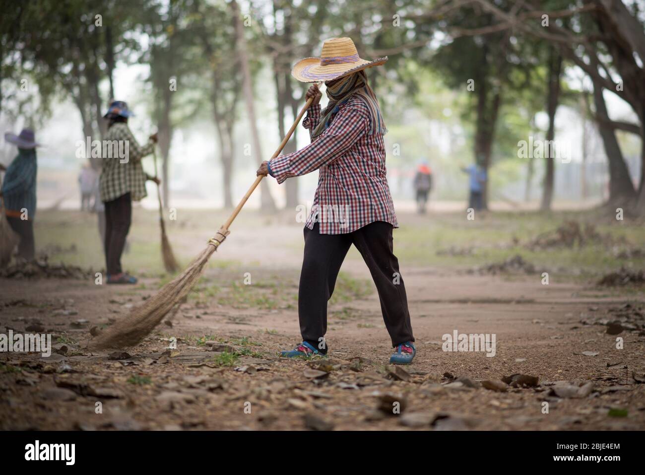 Female sweeper hi-res stock photography and images - Alamy