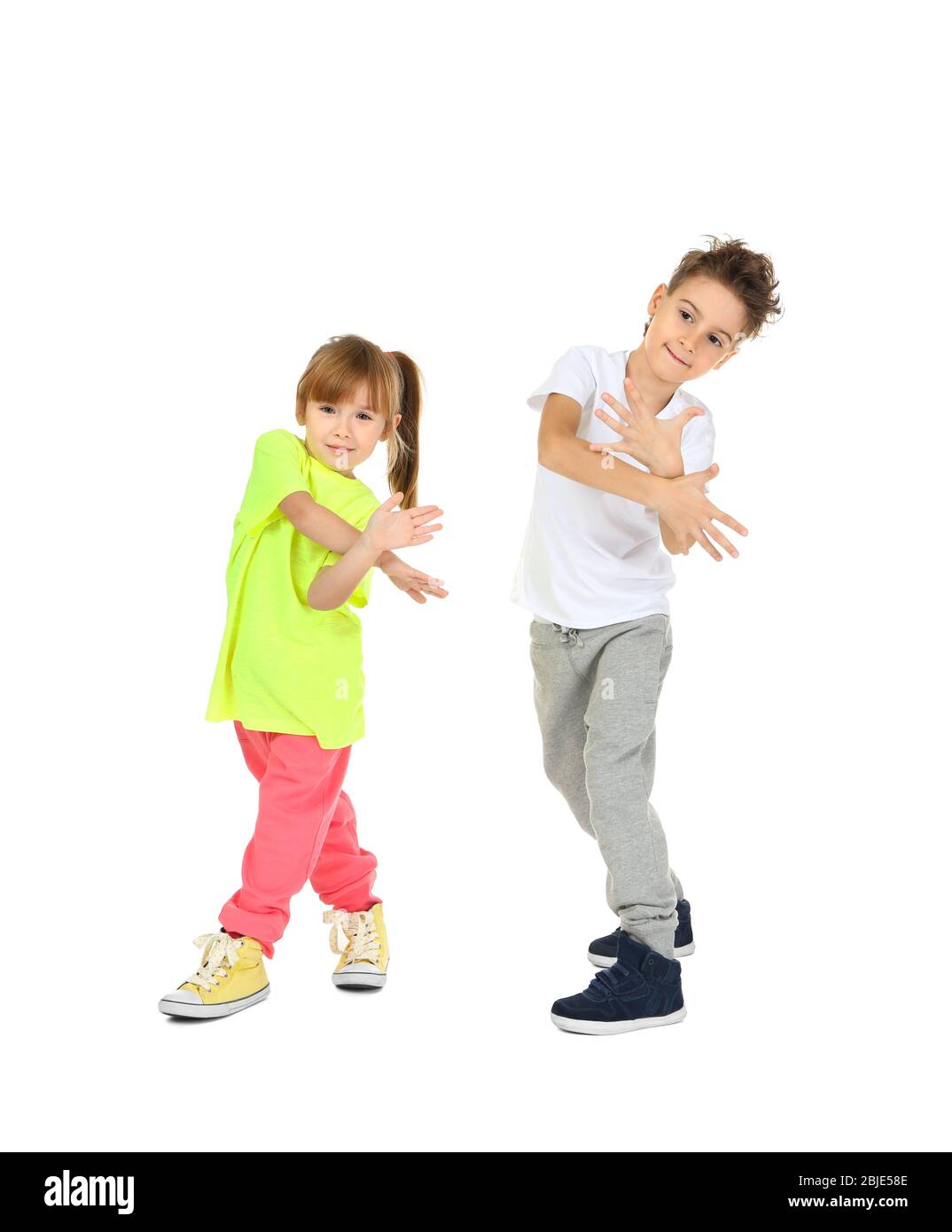 Cute funny children dancing on white background Stock Photo - Alamy