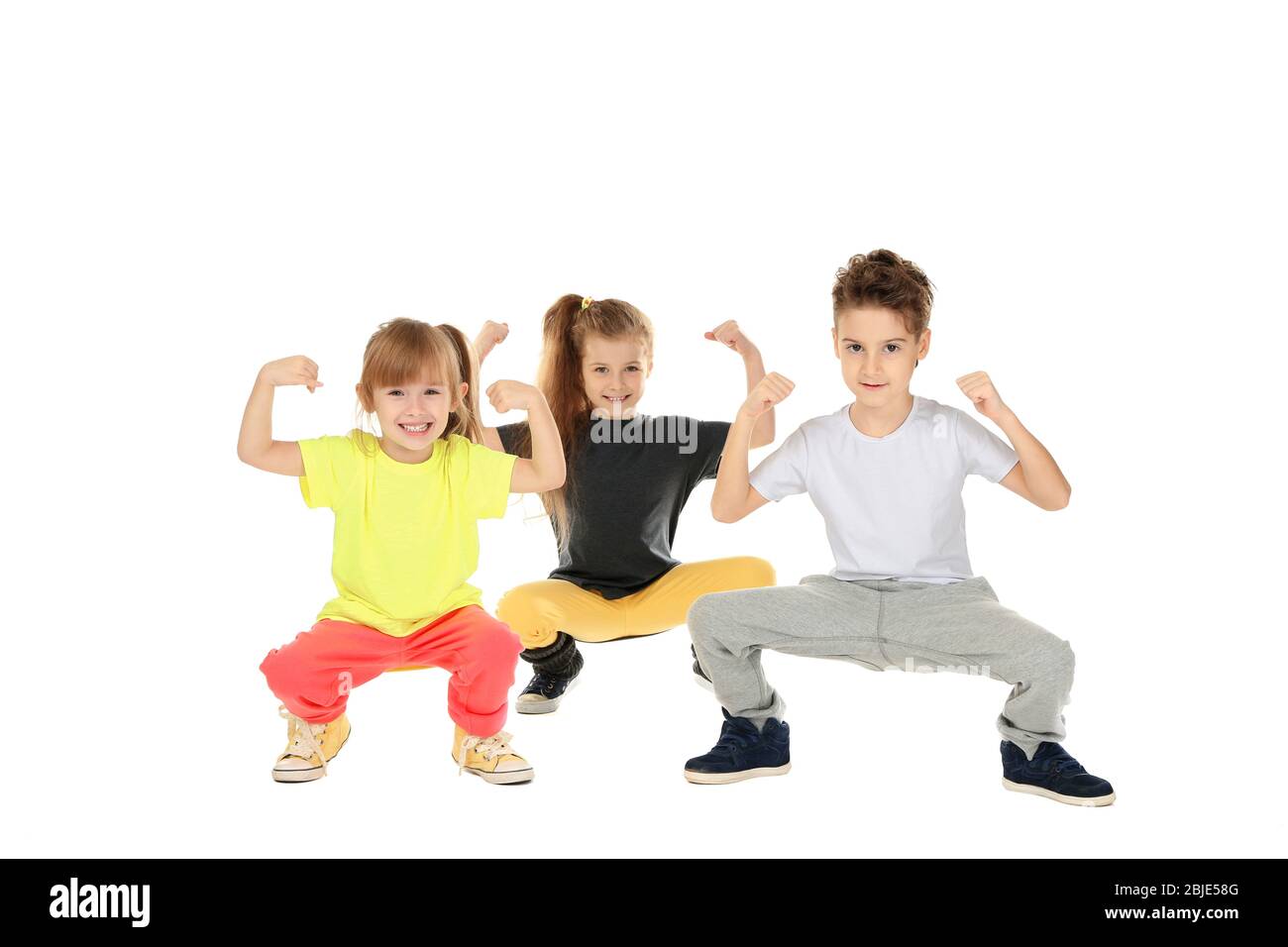 Cute funny children dancing on white background Stock Photo - Alamy