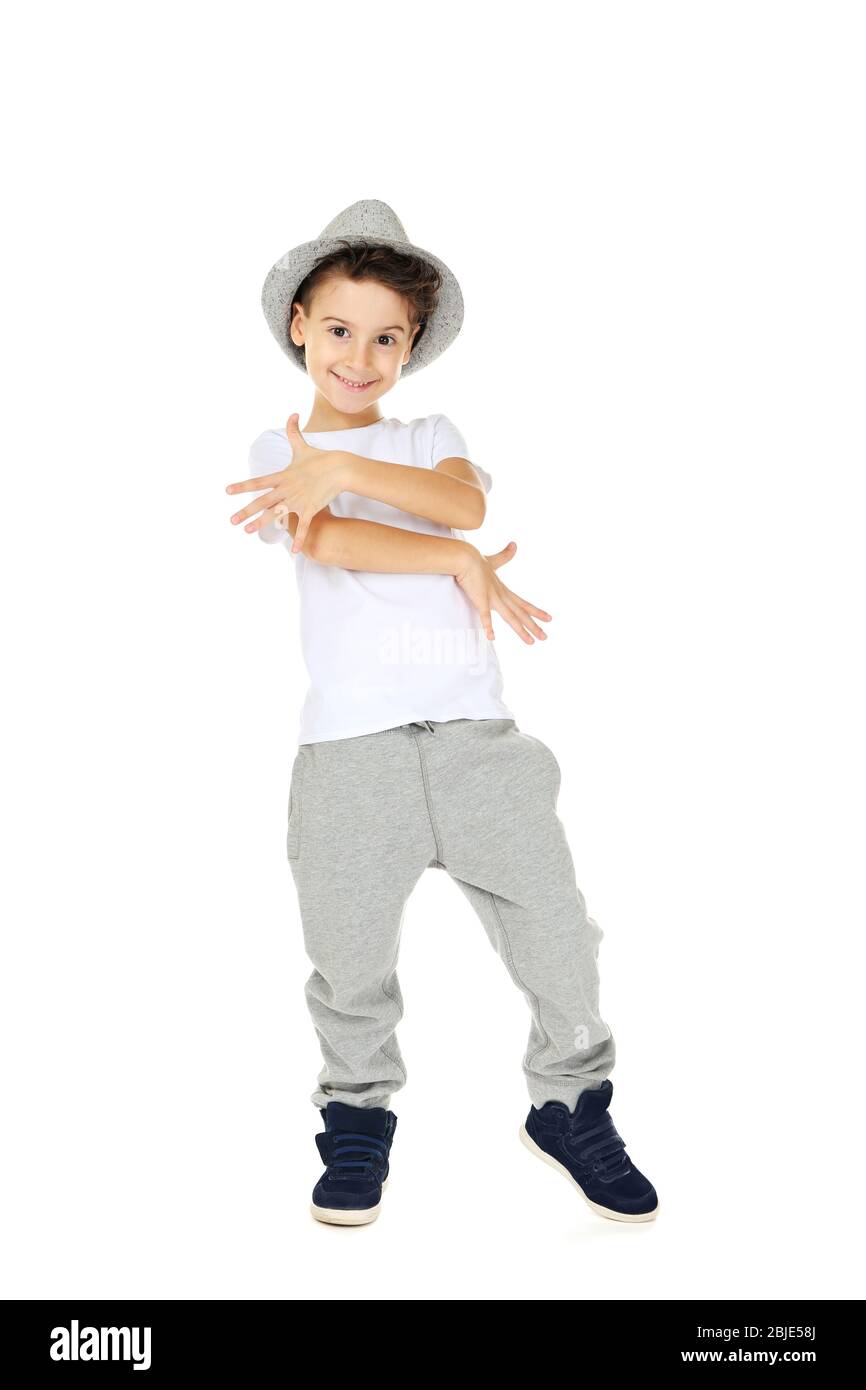 Cute boy dancing on white background Stock Photo - Alamy
