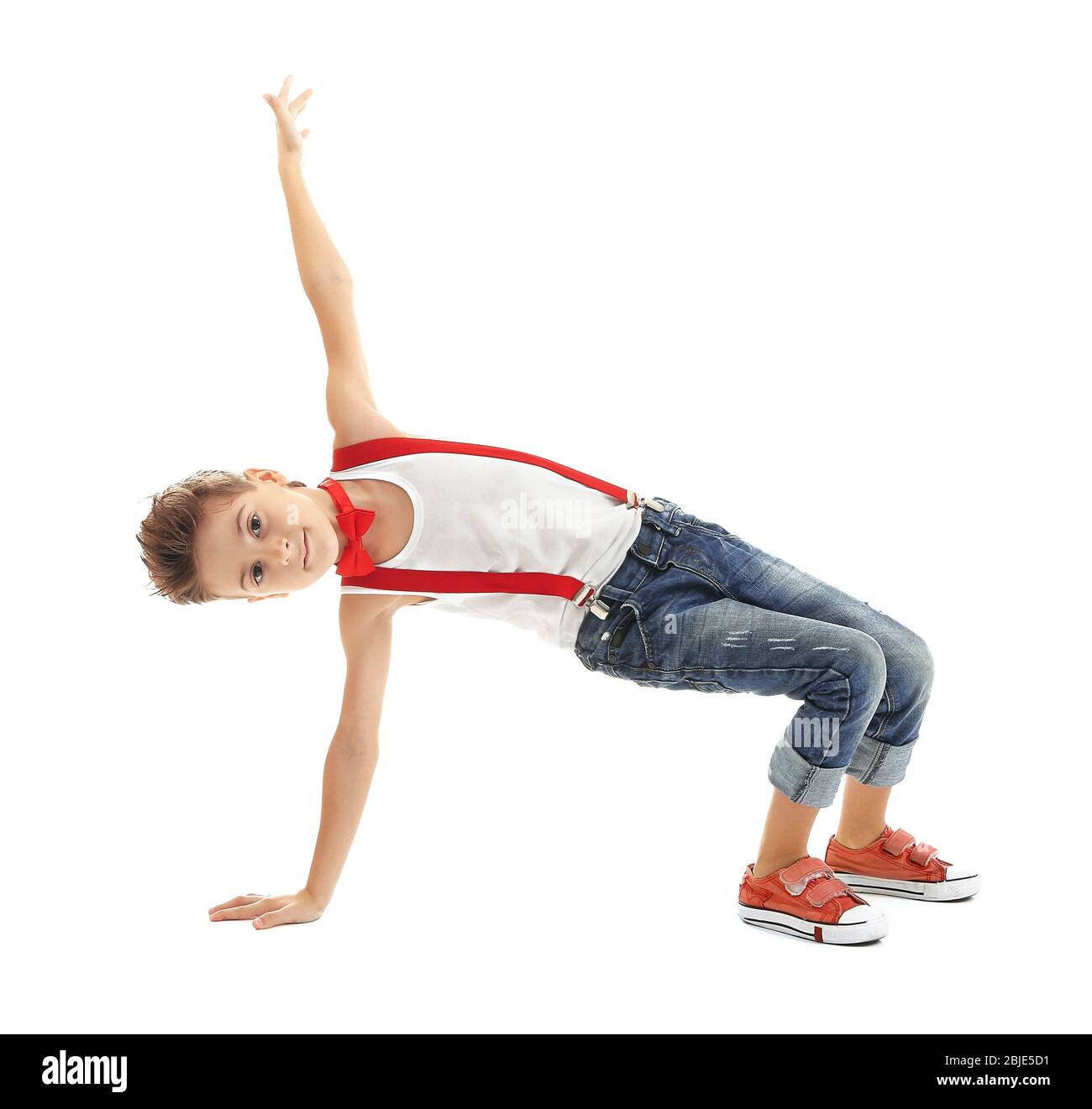 Cute little boy dancing on white background Stock Photo - Alamy