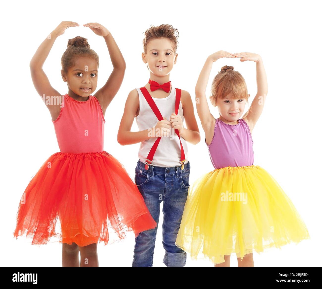 Cute little dancers on white background Stock Photo - Alamy