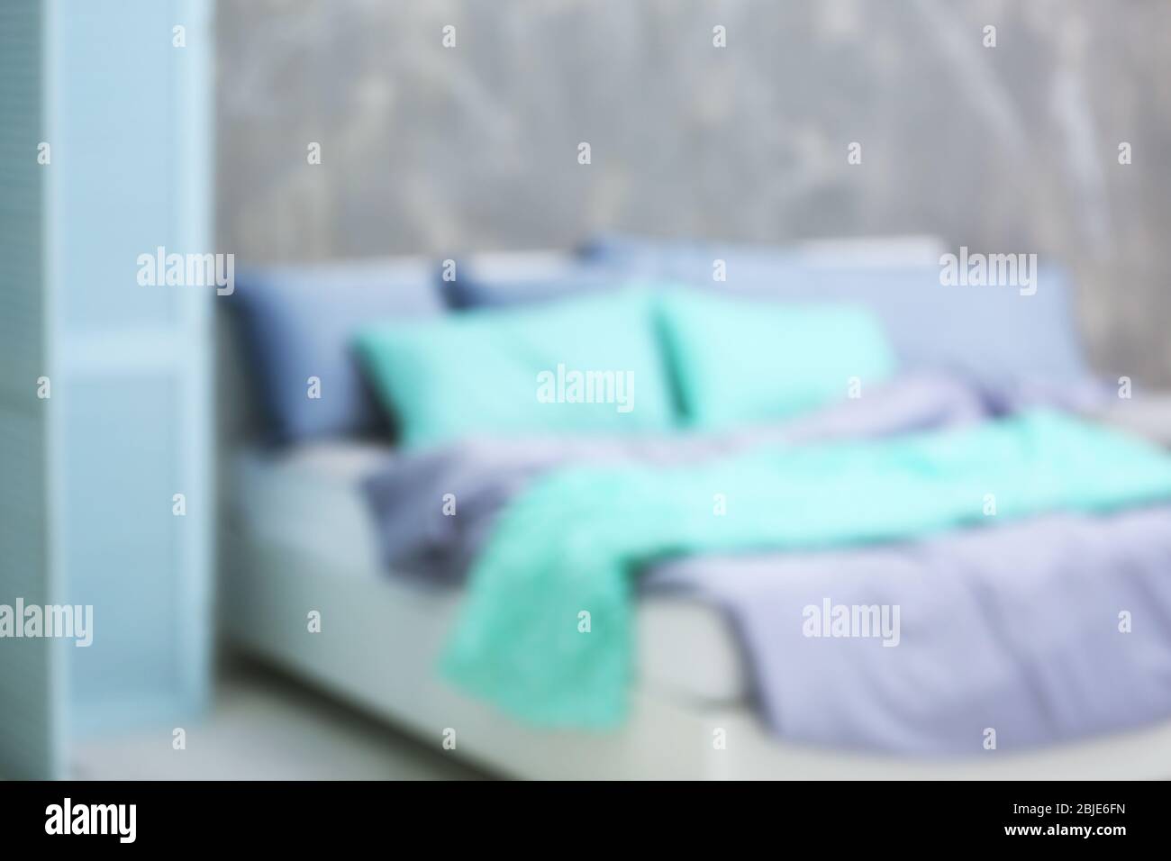 Blurred background of empty bed Stock Photo - Alamy
