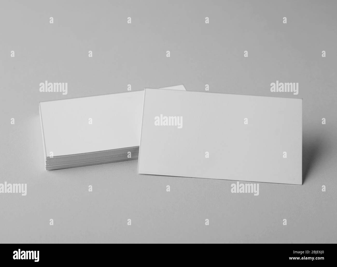 Blank business cards on white background Stock Photo - Alamy