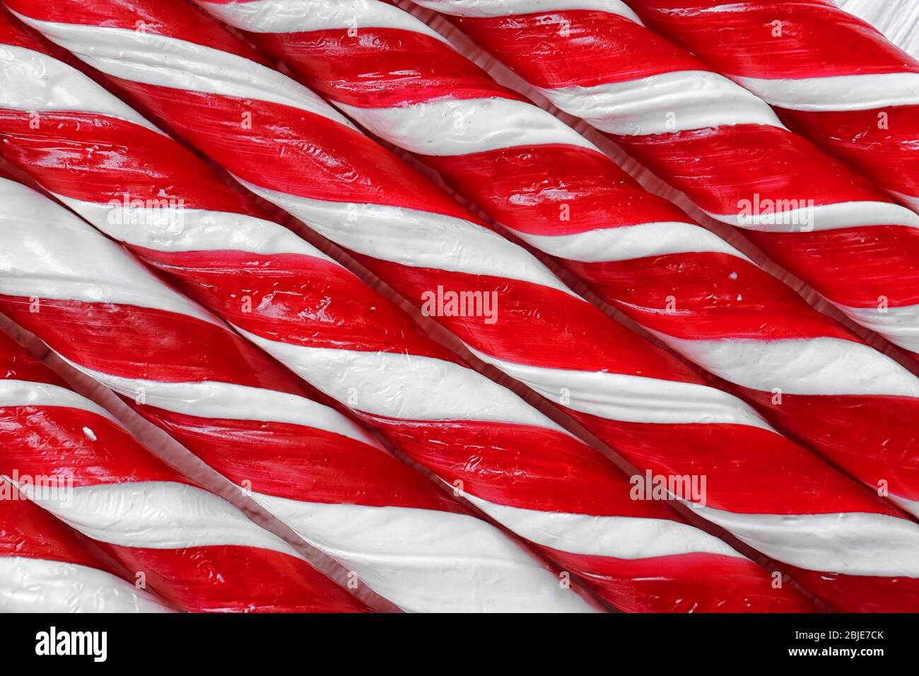 Red and white candy canes background Stock Photo - Alamy