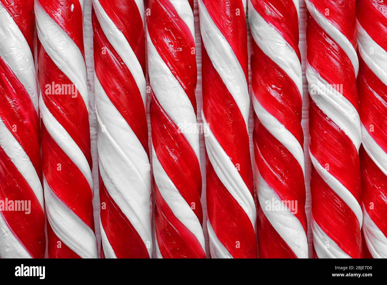 Red and white candy canes background Stock Photo - Alamy