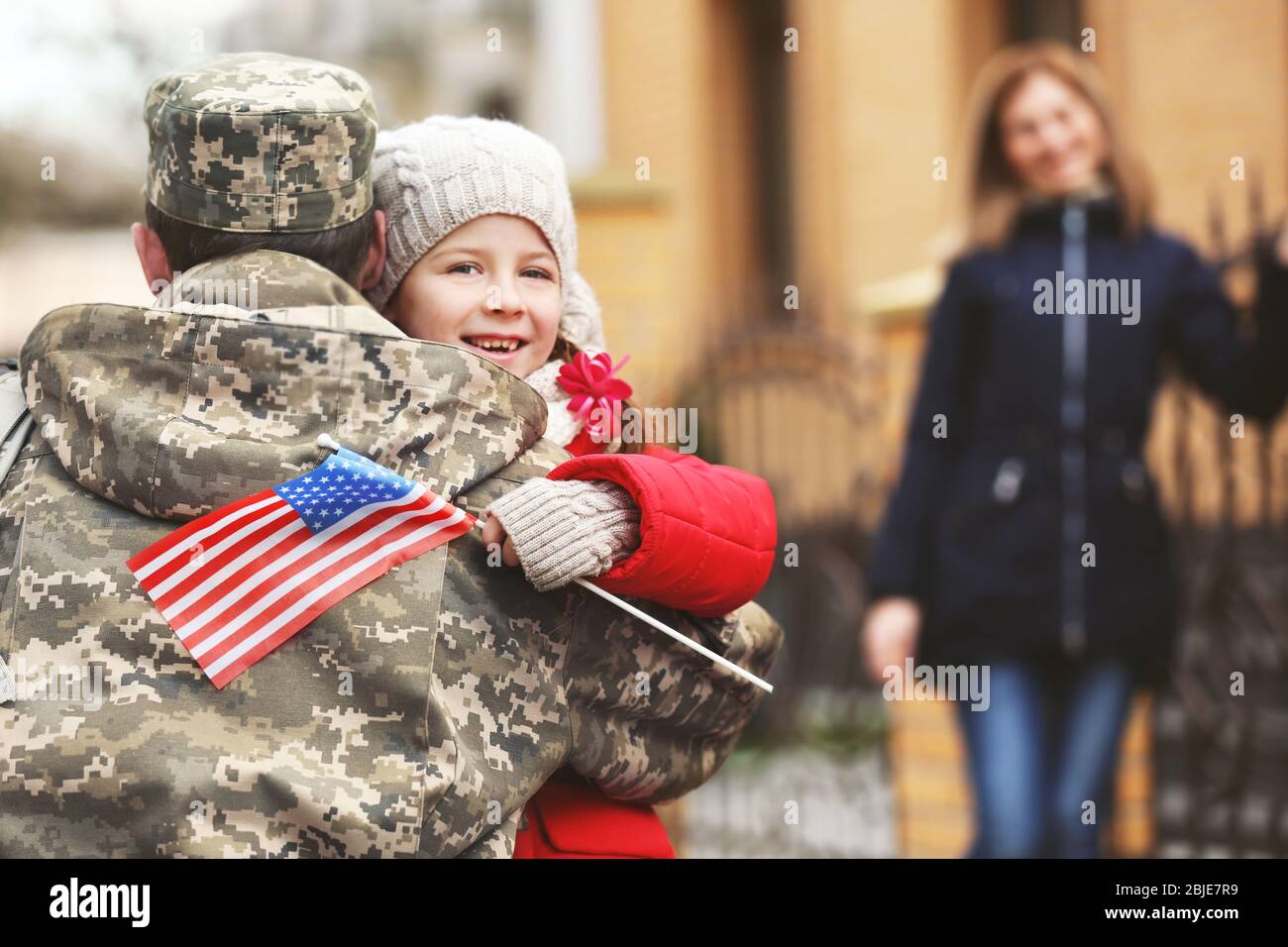 Happy reunion of soldier with family outdoors Stock Photo - Alamy