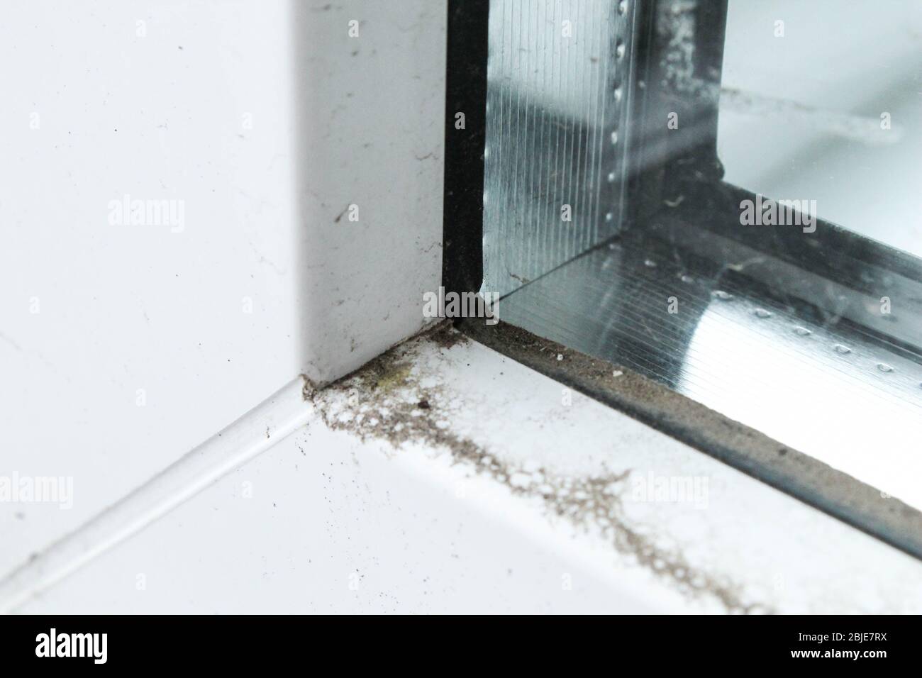 Dirty window block. Contaminated areas of a plastic window Stock Photo ...