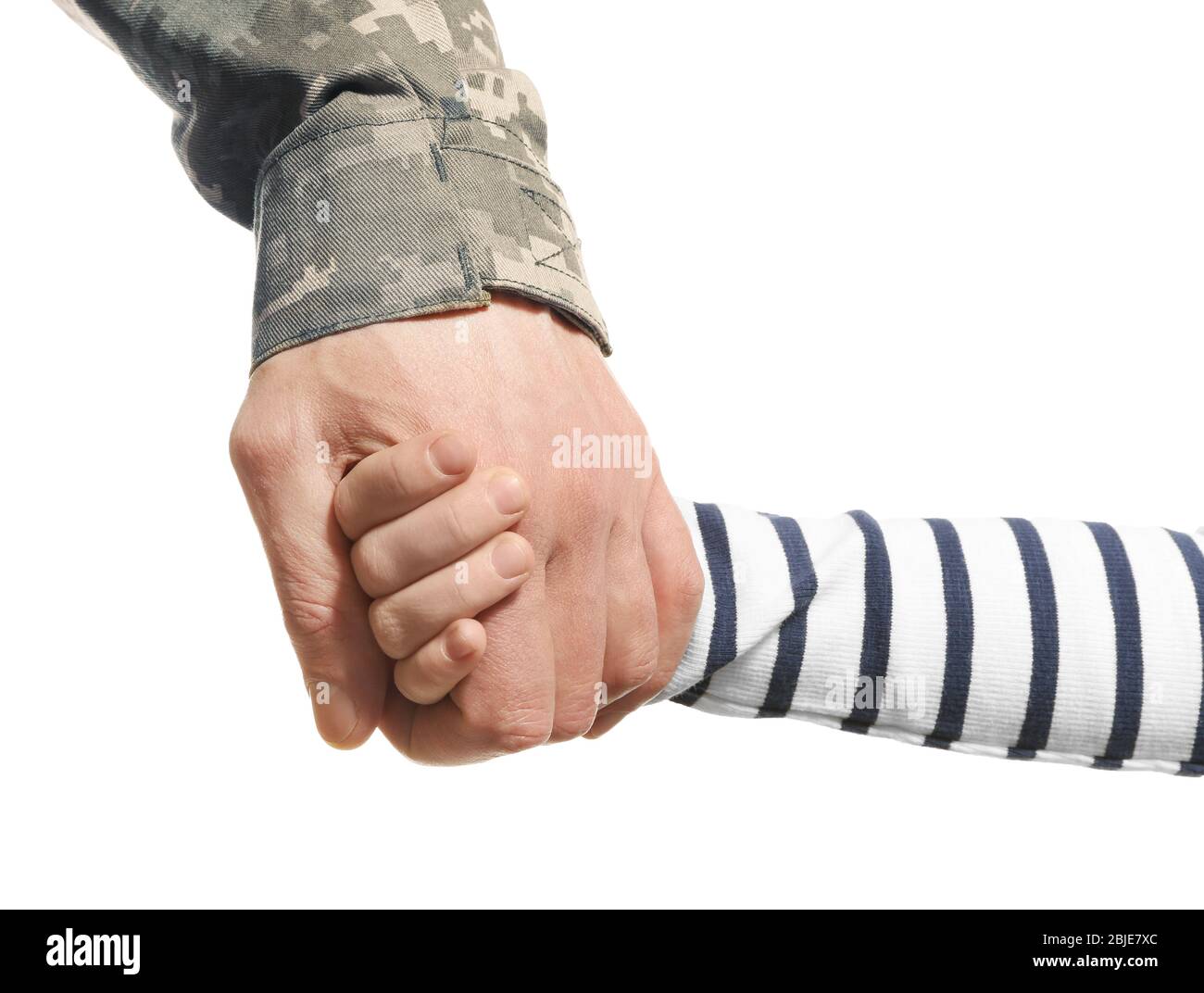 Soldier and child holding hands on white background, closeup Stock ...