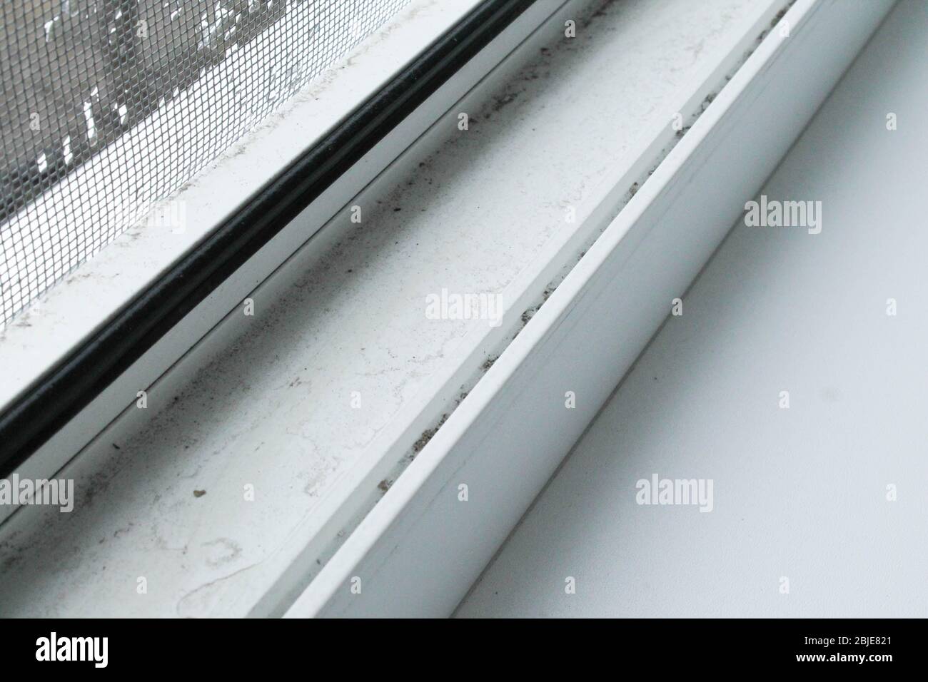 Dirty window block. Contaminated areas of a plastic window Stock Photo ...