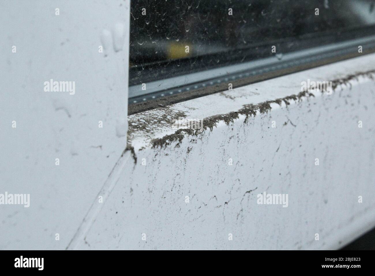 Dirty window block. Contaminated areas of a plastic window Stock Photo ...