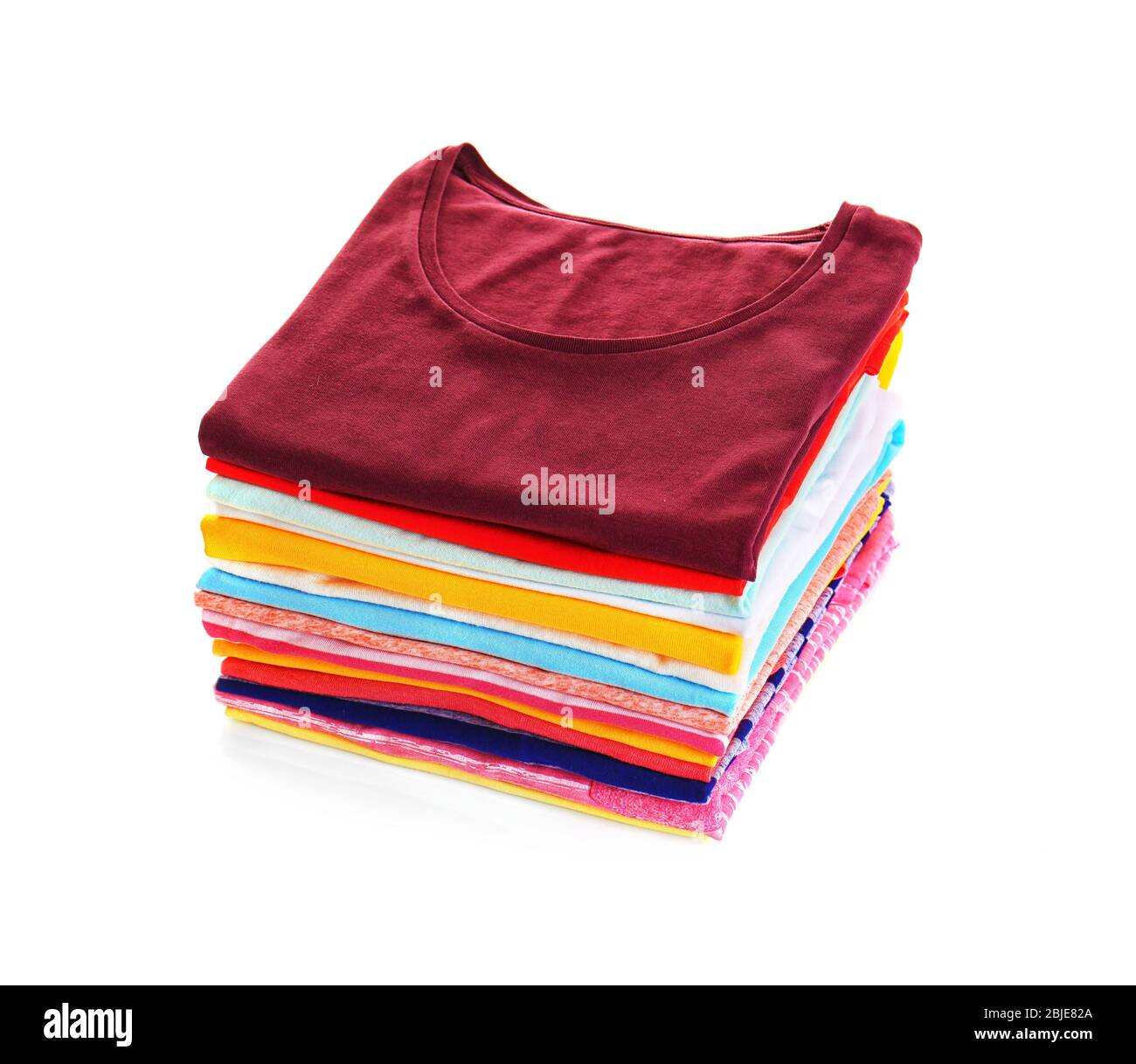 Stack of colorful clothes on white background, closeup Stock Photo - Alamy