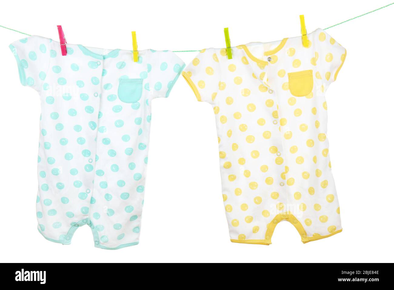 Baby clothes on white background Stock Photo - Alamy