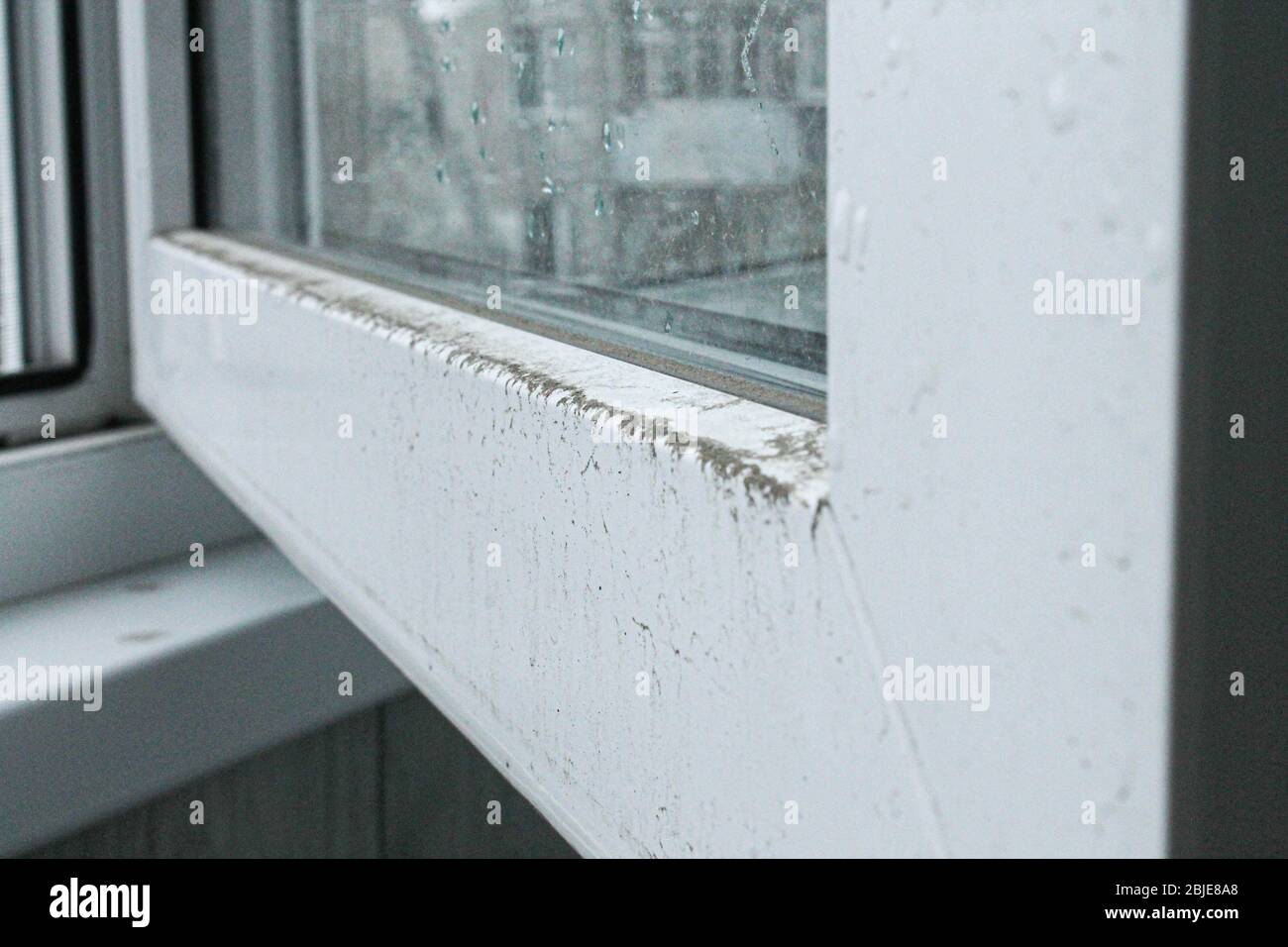 Dirty window block. Contaminated areas of a plastic window Stock Photo ...