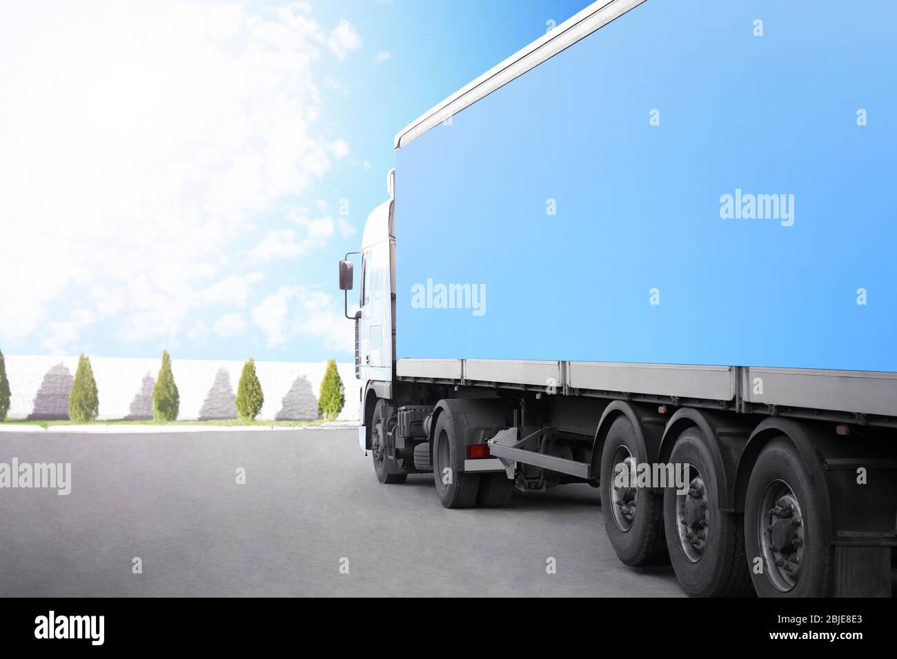 Side view of cargo truck Stock Photo - Alamy