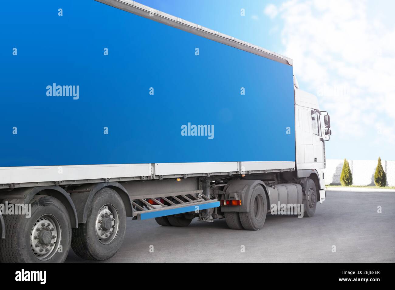 Side view of cargo truck Stock Photo - Alamy