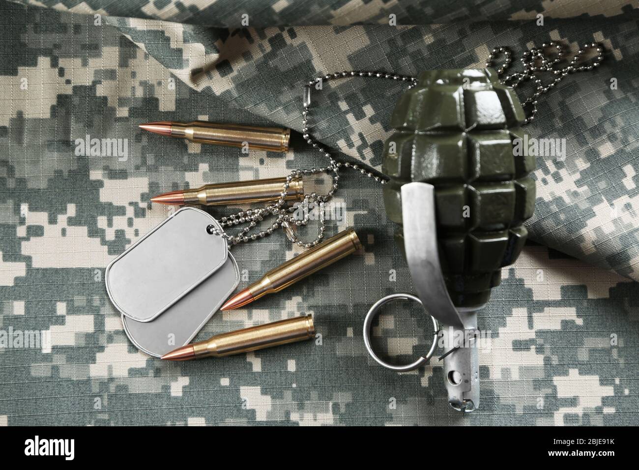 Military set on camouflage clothing Stock Photo - Alamy