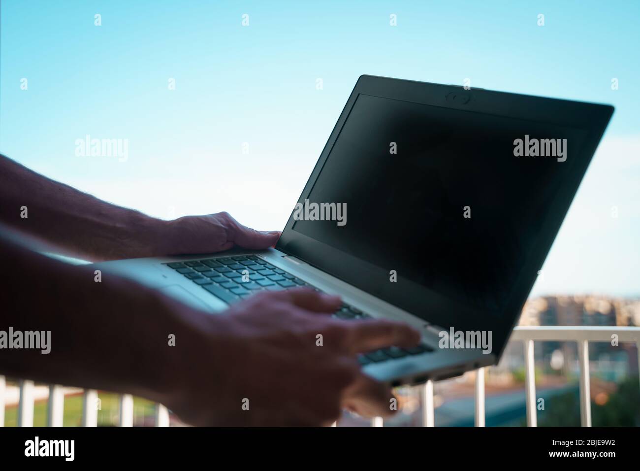 Hands working with laptop outside. Digital nomad concept Stock Photo ...
