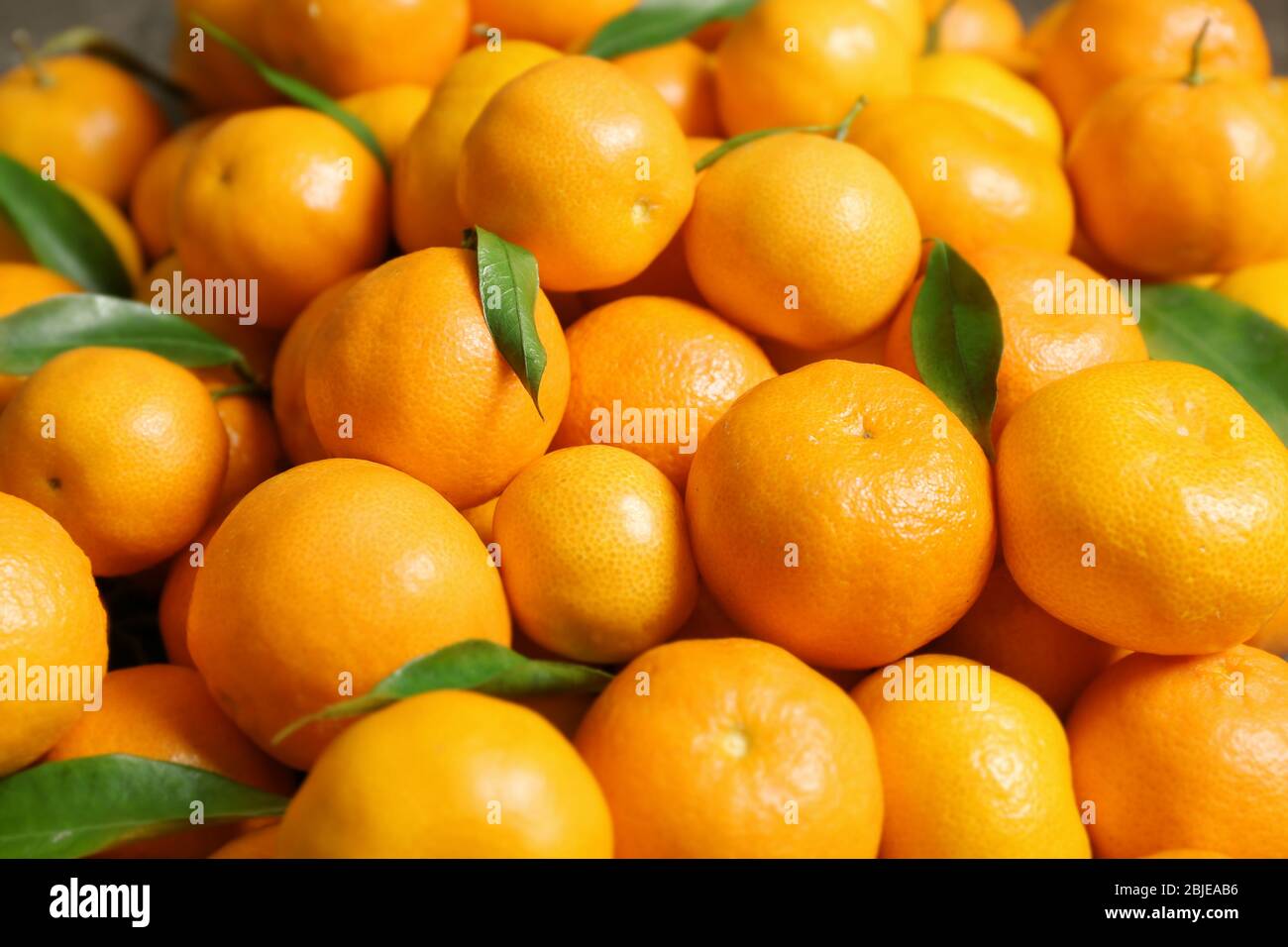 Tangerine background, closeup Stock Photo - Alamy