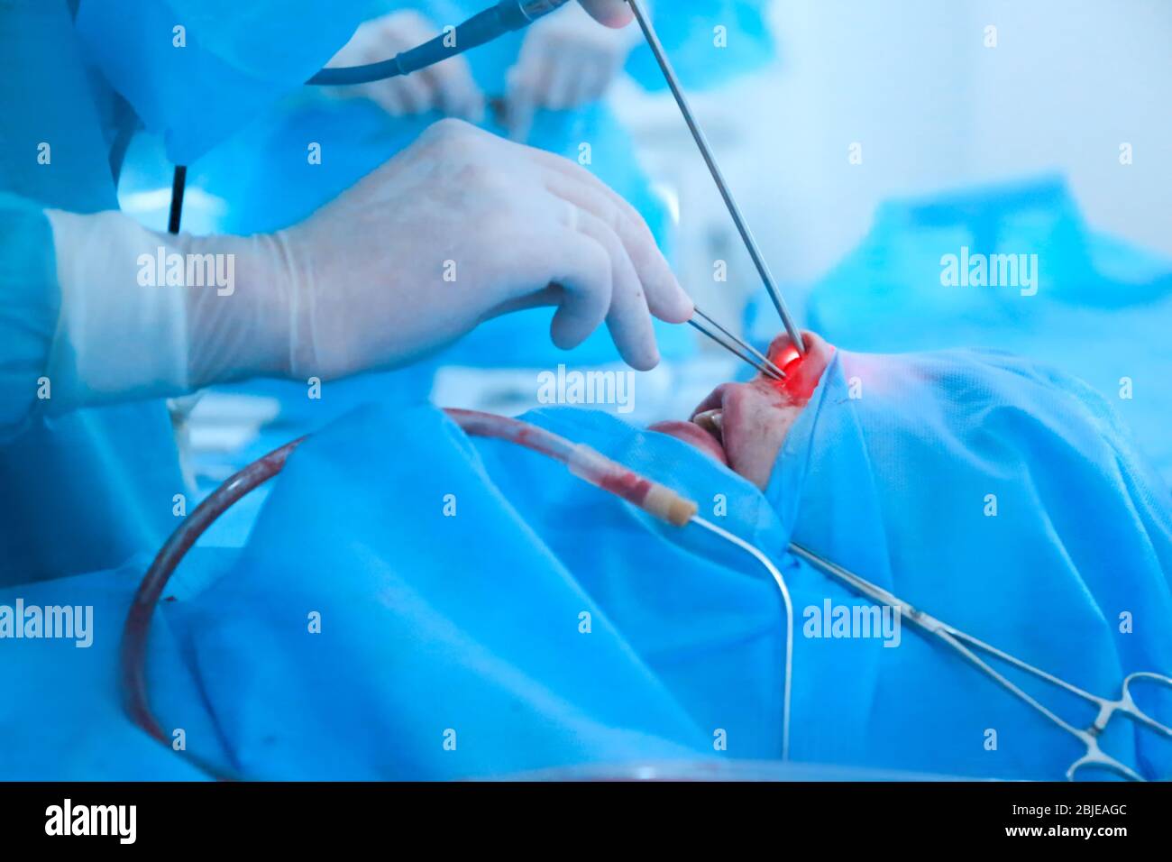 Operating of patient in modern hospital Stock Photo - Alamy