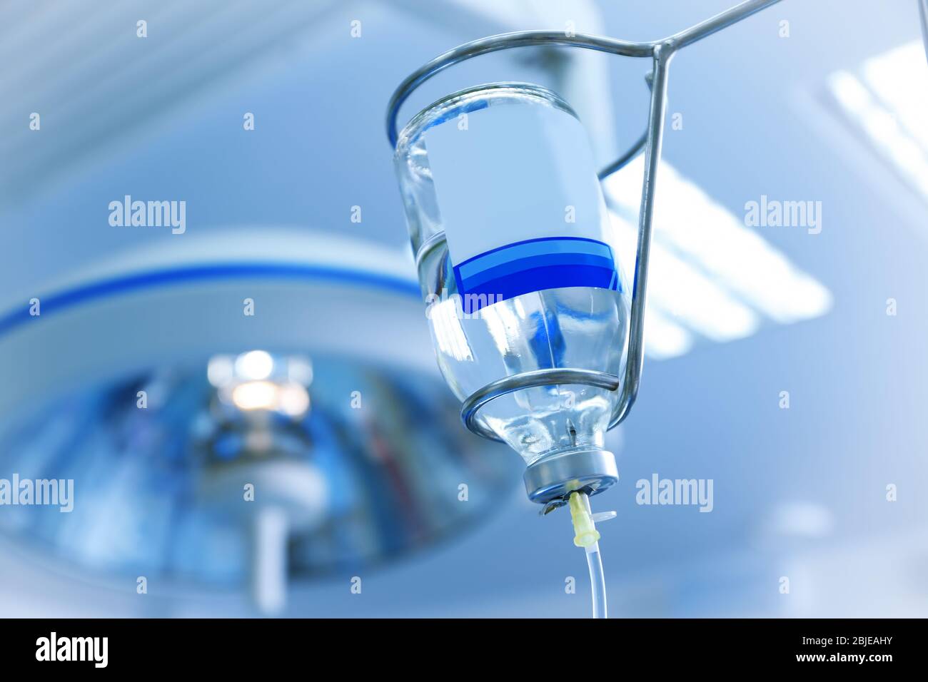 Infusion drip in hospital on blurred background Stock Photo - Alamy
