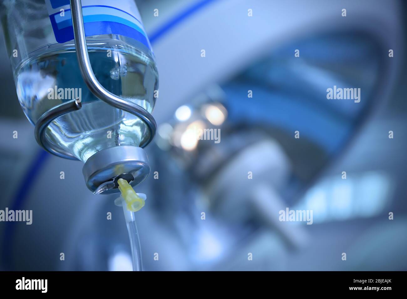 Infusion drip in hospital on blurred background Stock Photo - Alamy