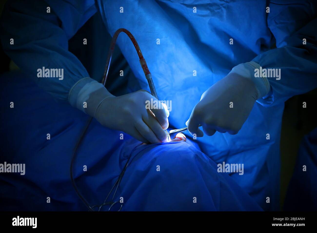 Operating of patient in modern hospital Stock Photo - Alamy