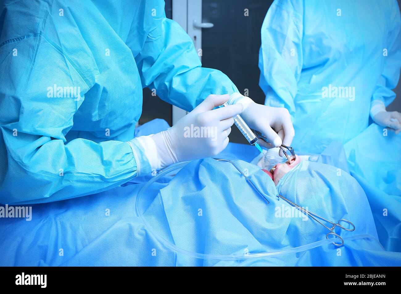 Operating of patient in modern hospital Stock Photo - Alamy