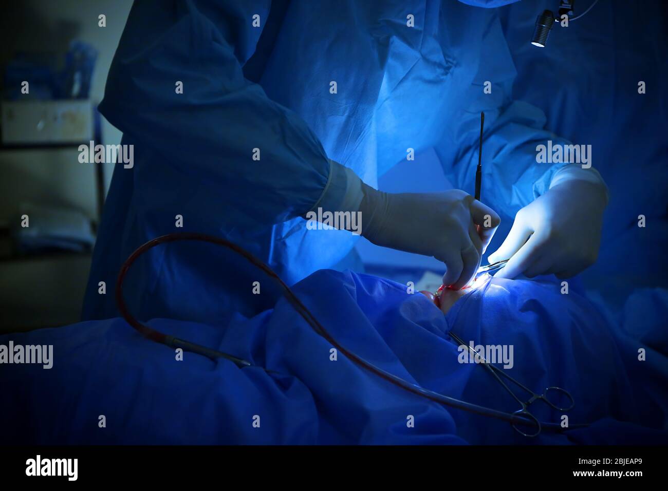Operating of patient in modern hospital Stock Photo - Alamy