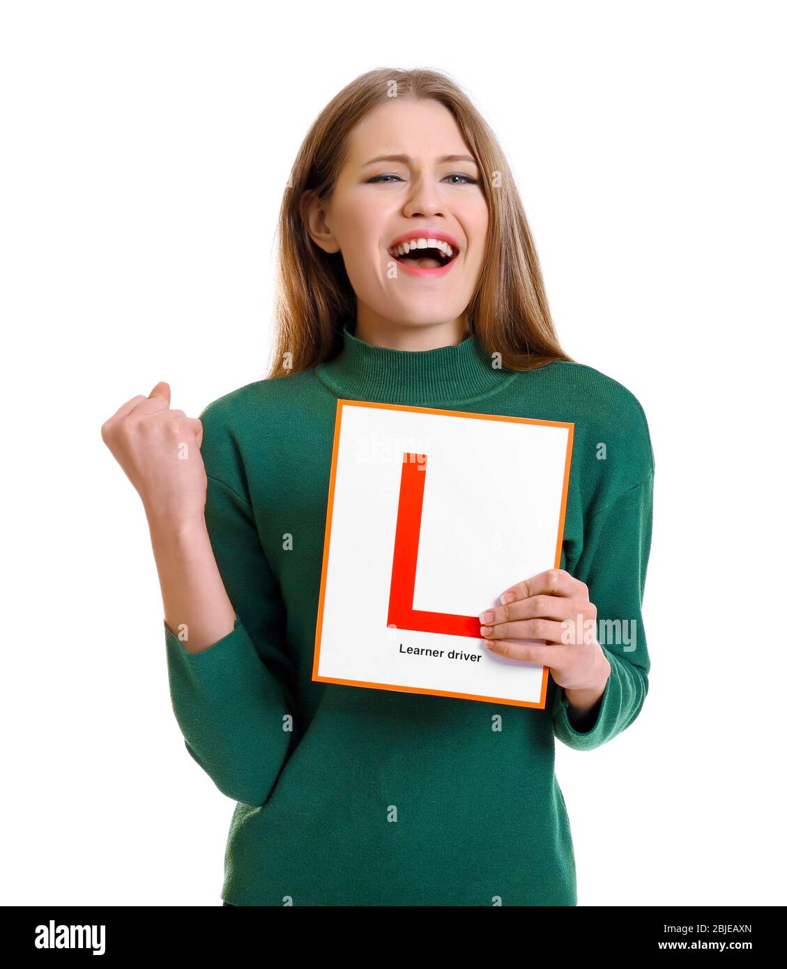 Young woman with learner driver sign on white background Stock Photo ...