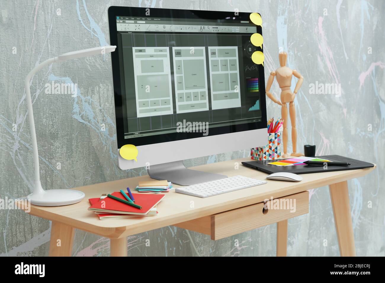 Workplace with computer on table in modern room Stock Photo - Alamy